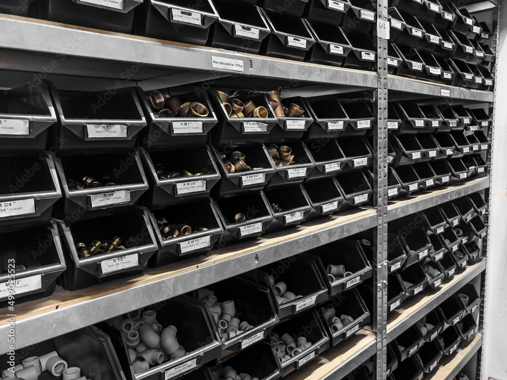 storage space with goods shelves in a small plumbing shop Stock Photo ...