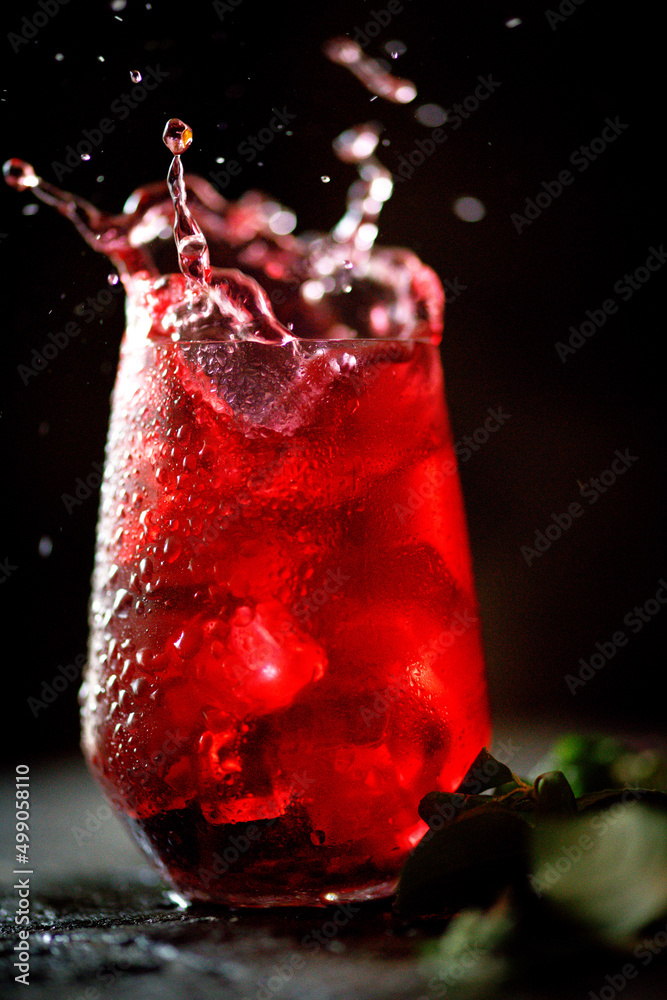 Splashed red fruit juice Stock Photo | Adobe Stock