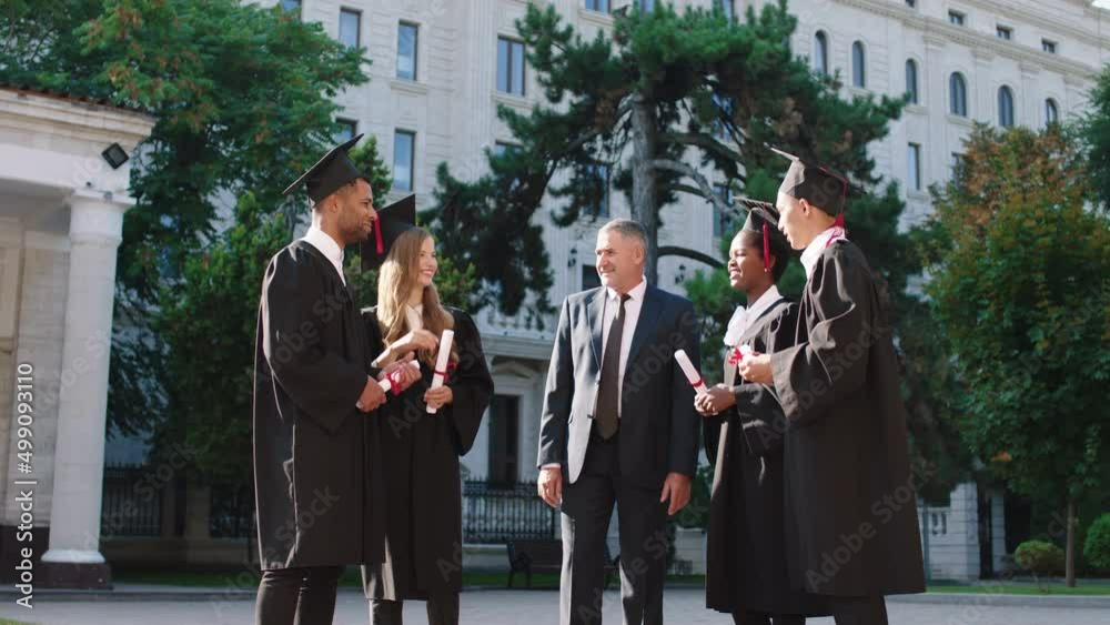 Happy group of students in the graduation day together with their ...