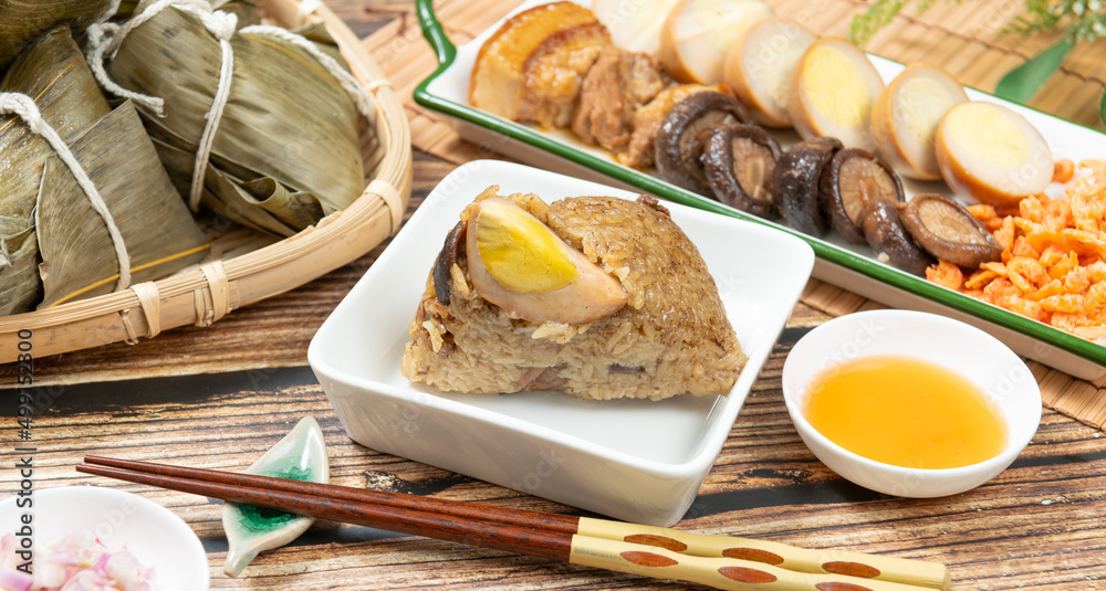 rice dumpling is a traditional Chinese rice dish made of glutinous rice ...