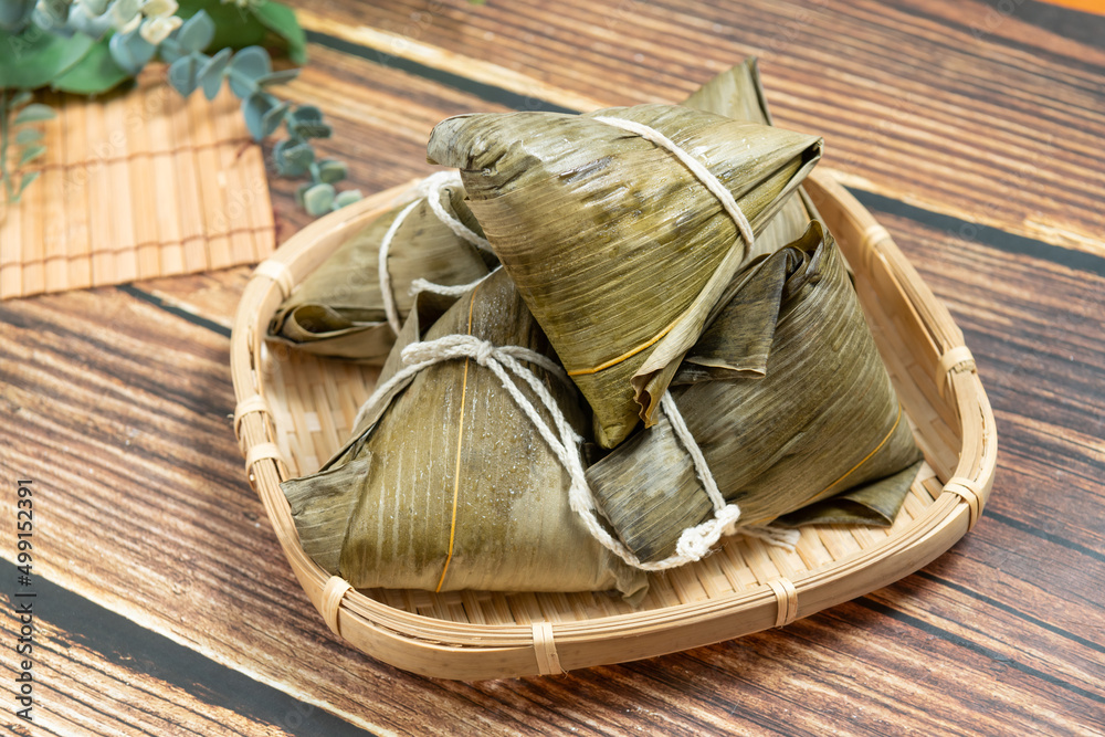 rice dumpling is a traditional Chinese rice dish made of glutinous rice ...