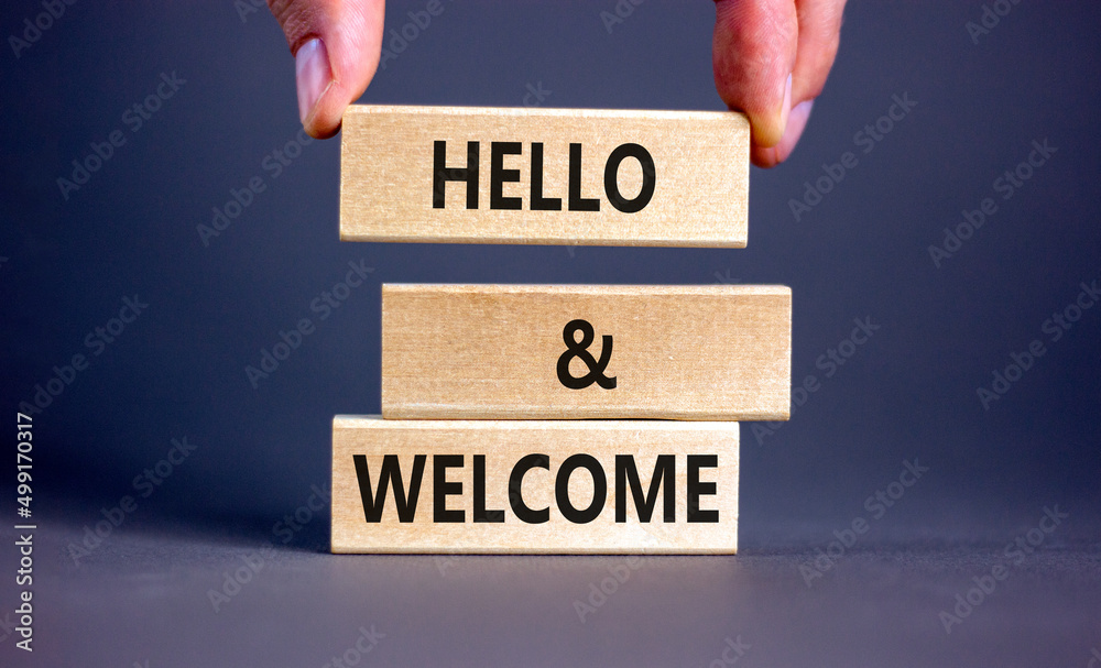 Hello and welcome symbol. Concept words Hello and welcome on wooden ...
