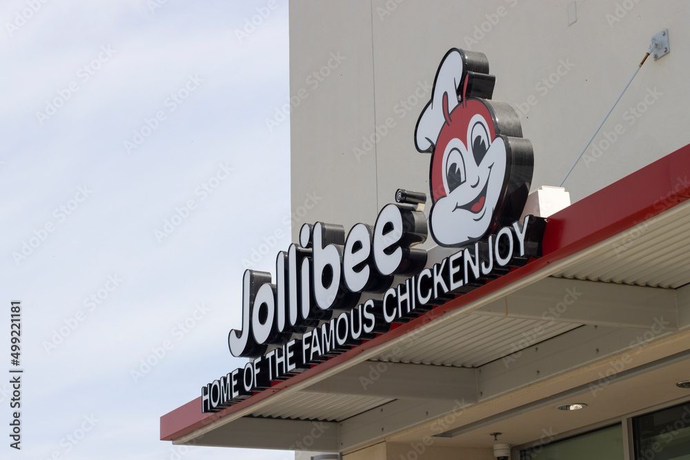 Delano, CA, USA - Mar 26, 2022: Closeup of the Jollibee logo at one of ...