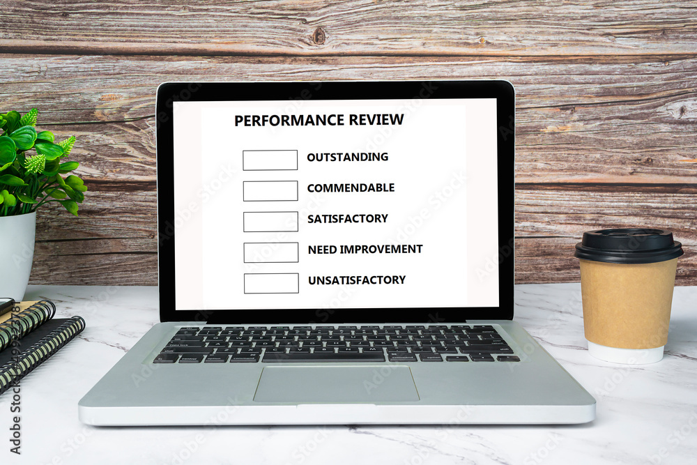 Performance review checklist text on white screen laptop or notebook ...
