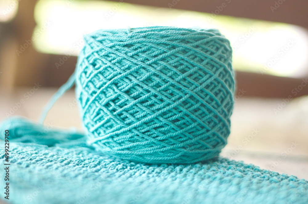 Blue dyed rope for crochet. Rope weaving crafts. Stock Photo | Adobe Stock