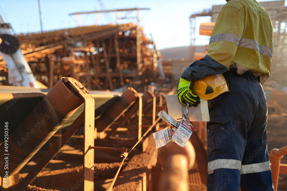 Safe work practises miner wearing work uniform safety glove holding ...