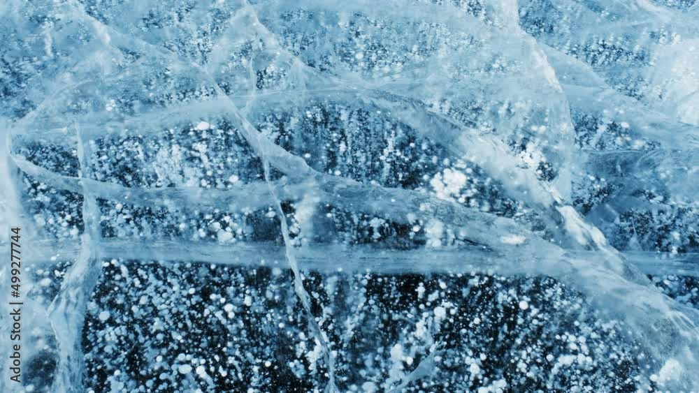 Beautiful transparent blue ice and frozen methane bubbles on Baikal ...