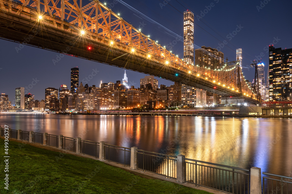 Photo & Art Print Illuminated Queensborough Bridge spanning from the ...