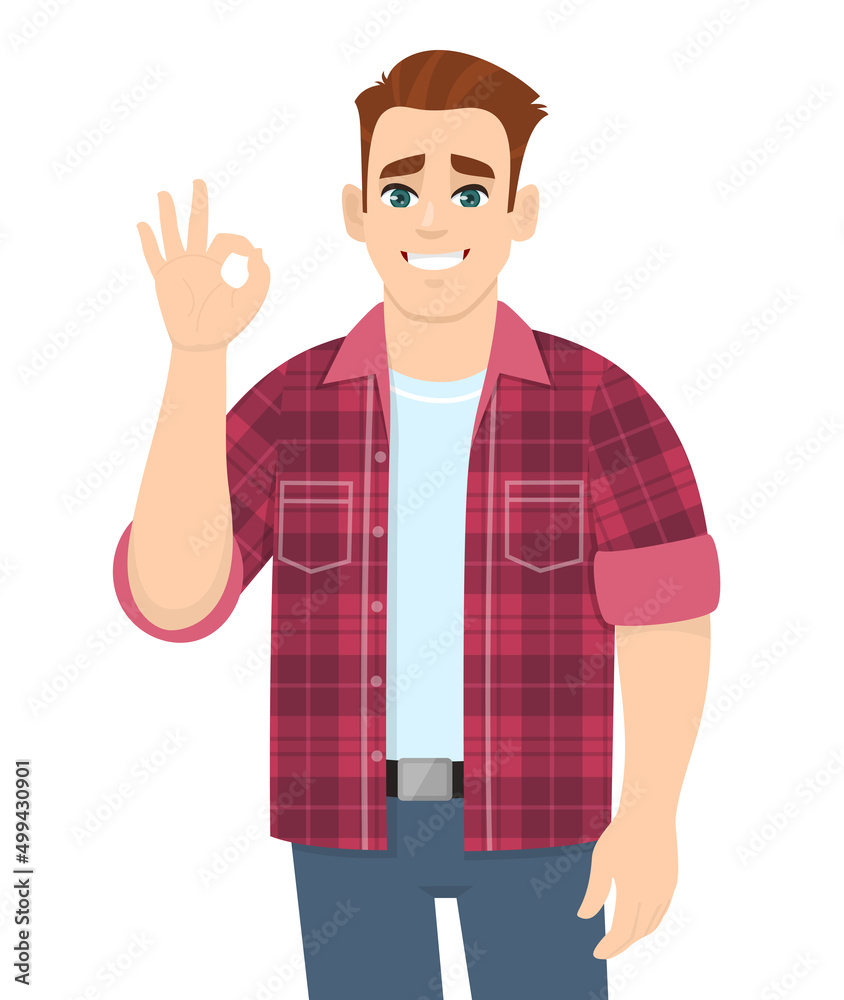 Stylish young man showing okay sign. Trendy person making OK or cool ...