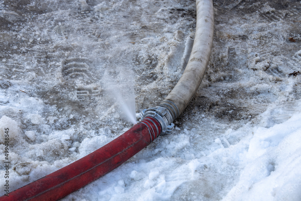 Expired Fire Hose , water leaking. water leaking from hole in a ...