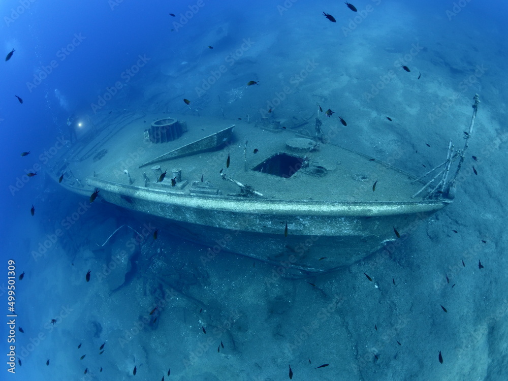 ship wreck underwater deep sea bottom metal on ocean floor scuba divers ...