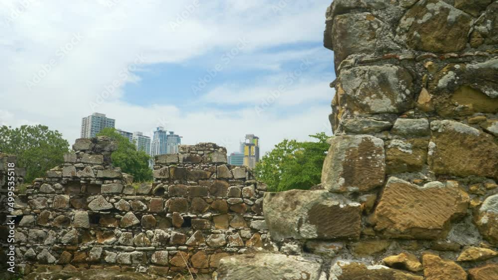 CLOSE UP: Decaying walls of ancient buildings in the green park of ...