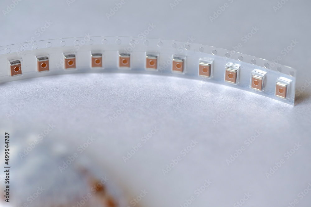 Microelectronic Industry Concepts. Closeup of Tape with SMD or Surface ...