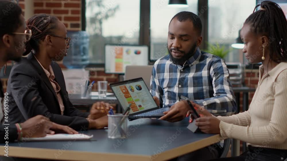 African american team of people collaborating on business strategy ...