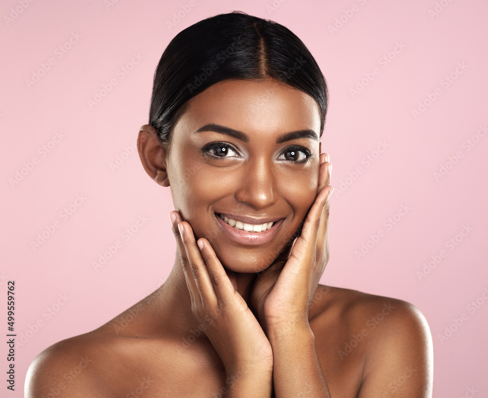 The perfect smile to match her perfect skin. Studio portrait of a ...