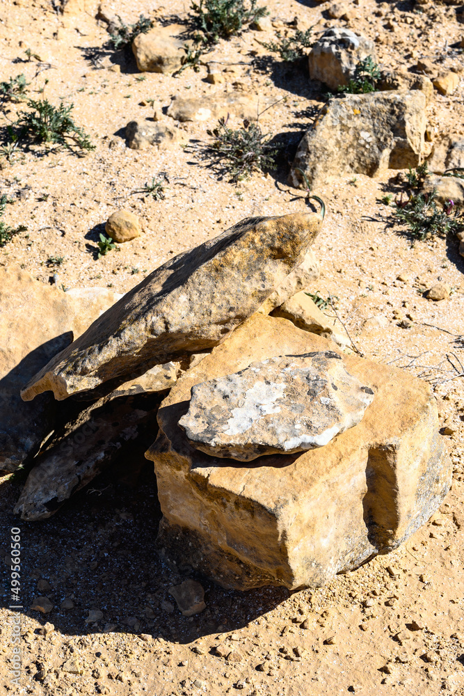 stacked together stones of different sizes and shapes in the desert ...