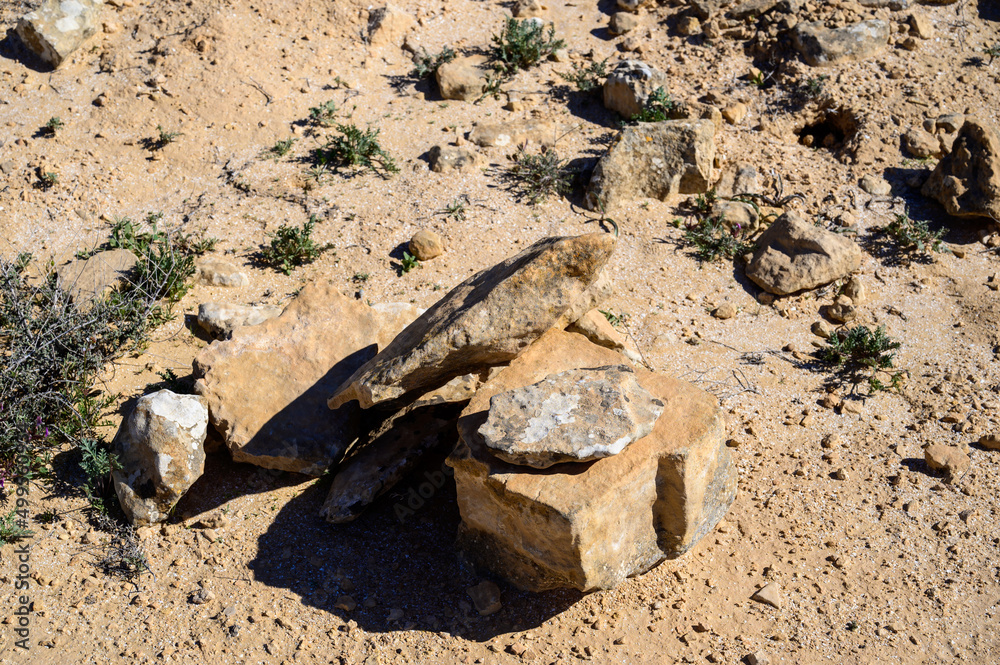 stacked together stones of different sizes and shapes in the desert ...