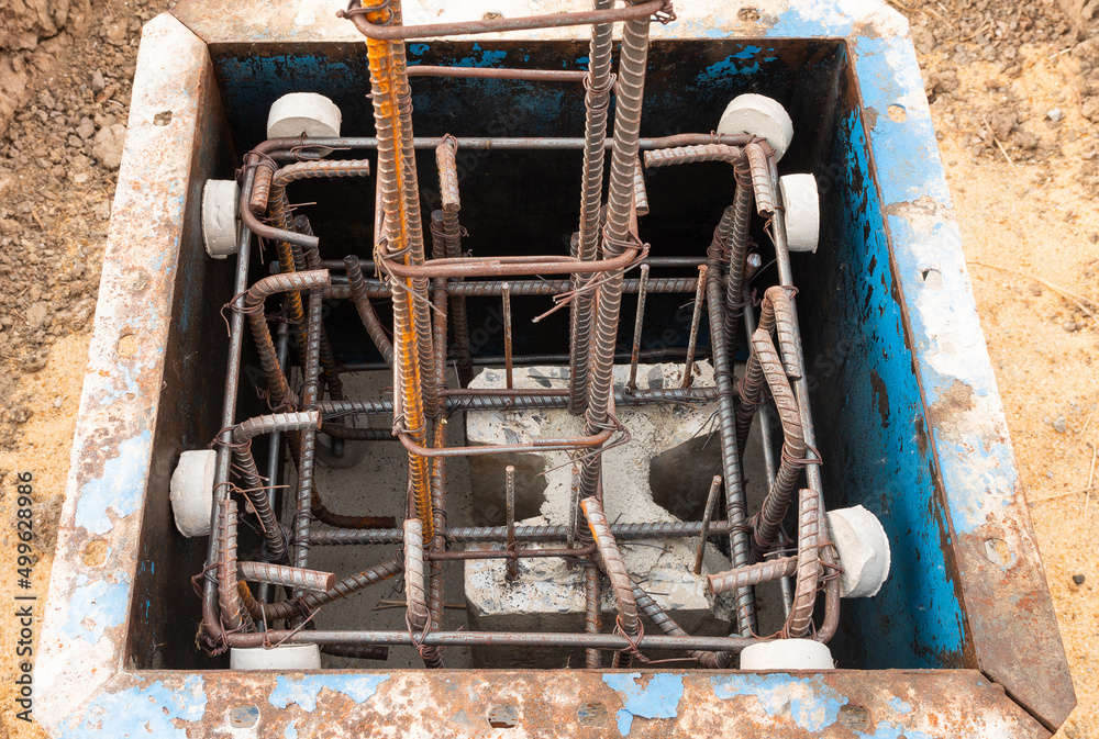Construction of reinforced concrete foundation with piles to support ...