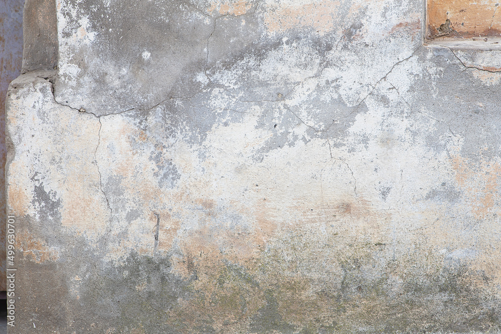 Old flaky wall with destroyed plaster. Renovation of old house ...