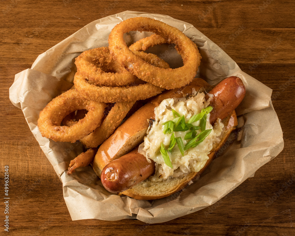 Hot Dog and Onion Rings in a Basket Stock Photo | Adobe Stock