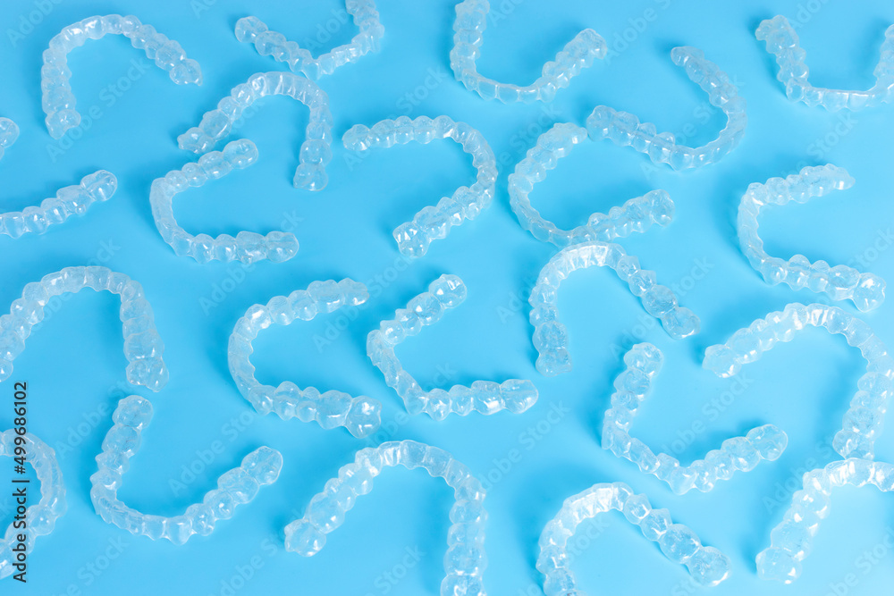 Invisible transparent orthodontic retainers invisalign on blue ...