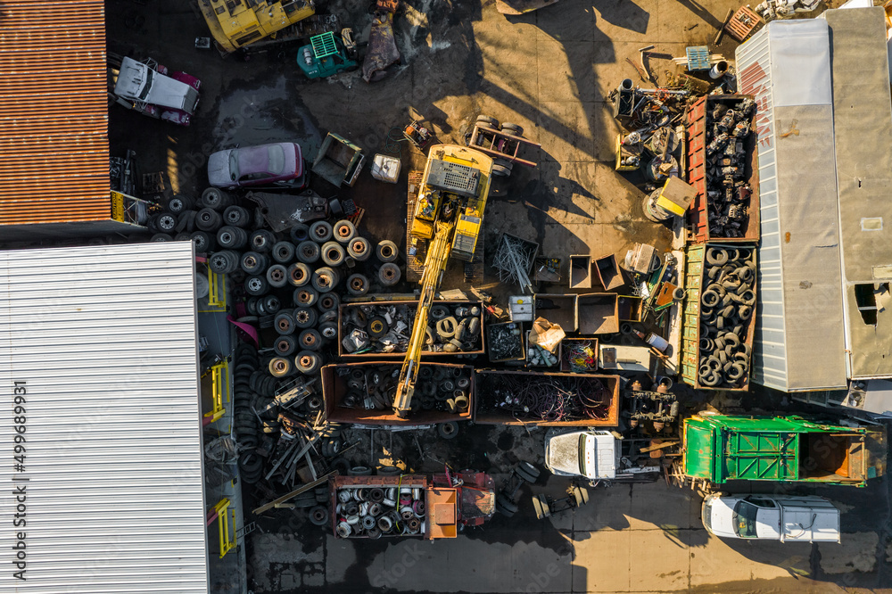 Crane moving parts around the junkyard Stock Photo | Adobe Stock