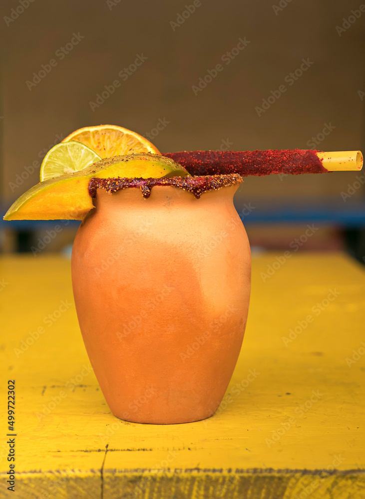 tequila cocktail mixed with grapefruit flavored soda, garnished with ...