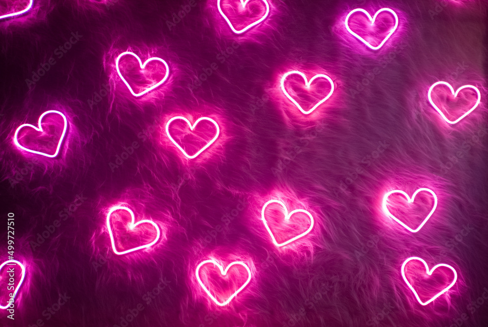 Neon pink heart on white fur. Valentine's day background Stock Photo ...