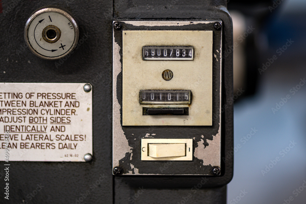 Vintage offset printing press panel with switches, counters and dials Stock Photo | Adobe Stock