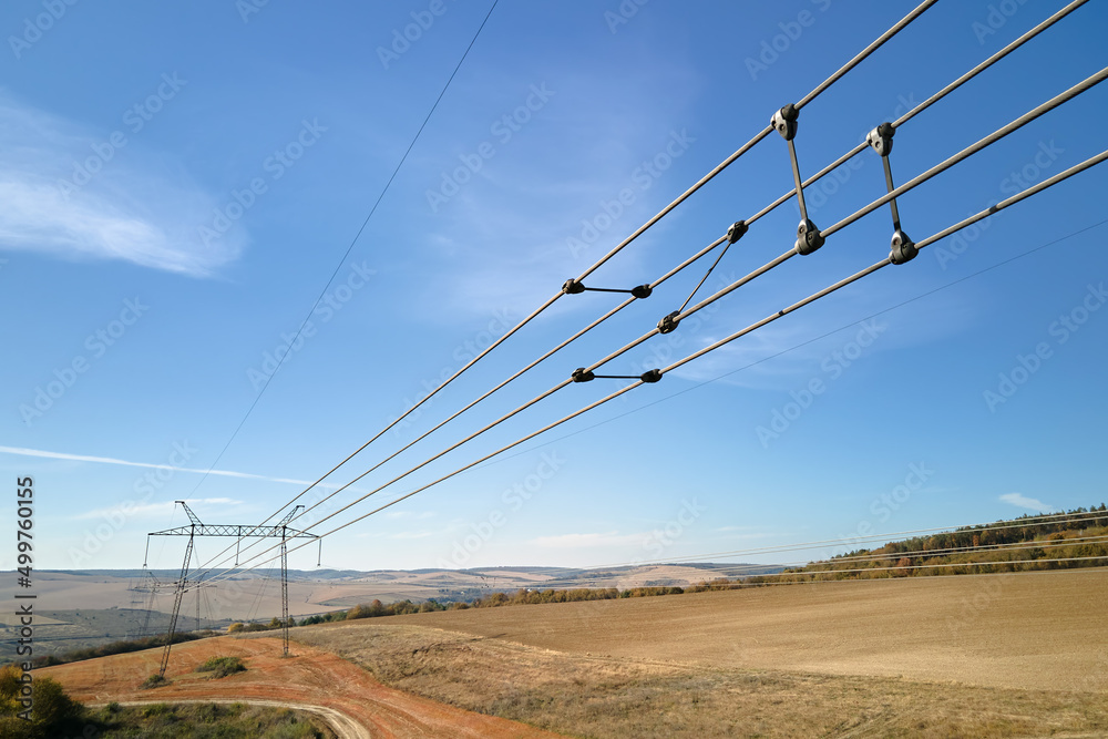 High voltage power line with insulation divider of electric power wires ...