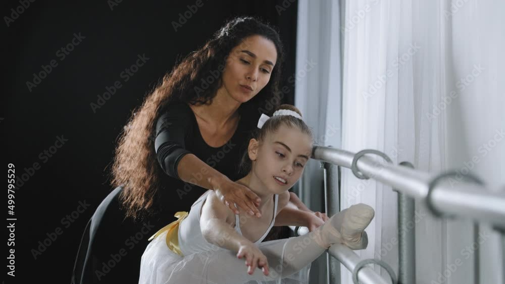 Female choreographer teacher mentor trainer of classical dance teaches ...