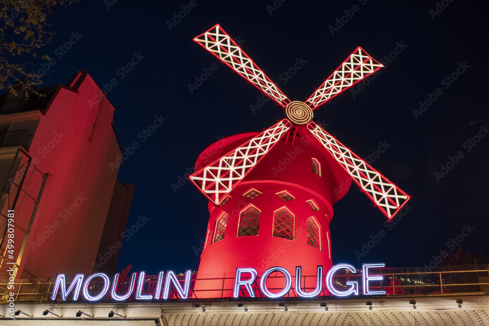 Paris, France, 08-04-2022: the neon signs and exteriors of the Moulin ...
