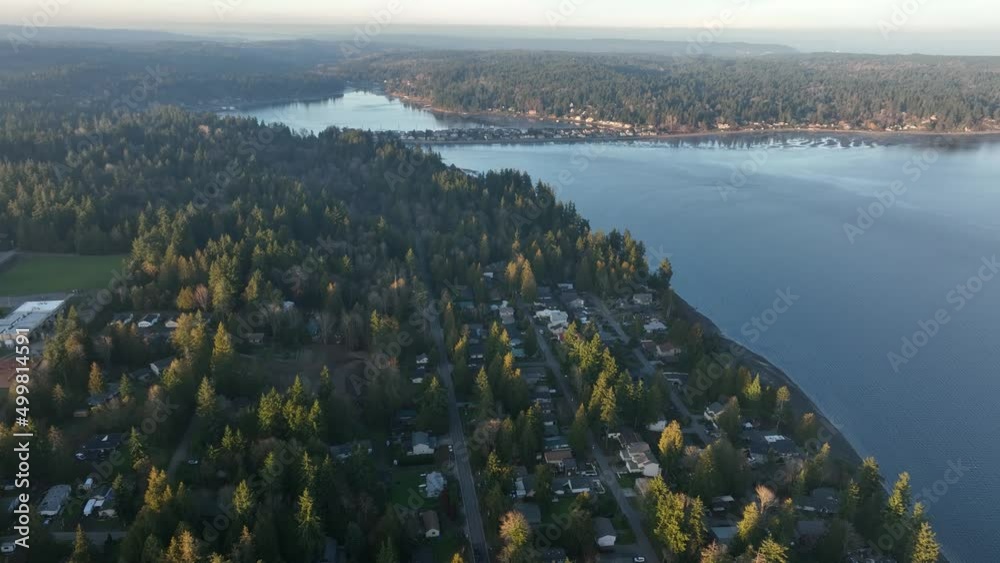 Cinematic drone panning shot of the city of Suquamish of the Suquamish ...