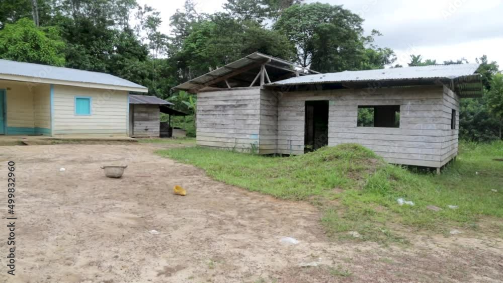 Wooden slums in an African village. low income african village ...