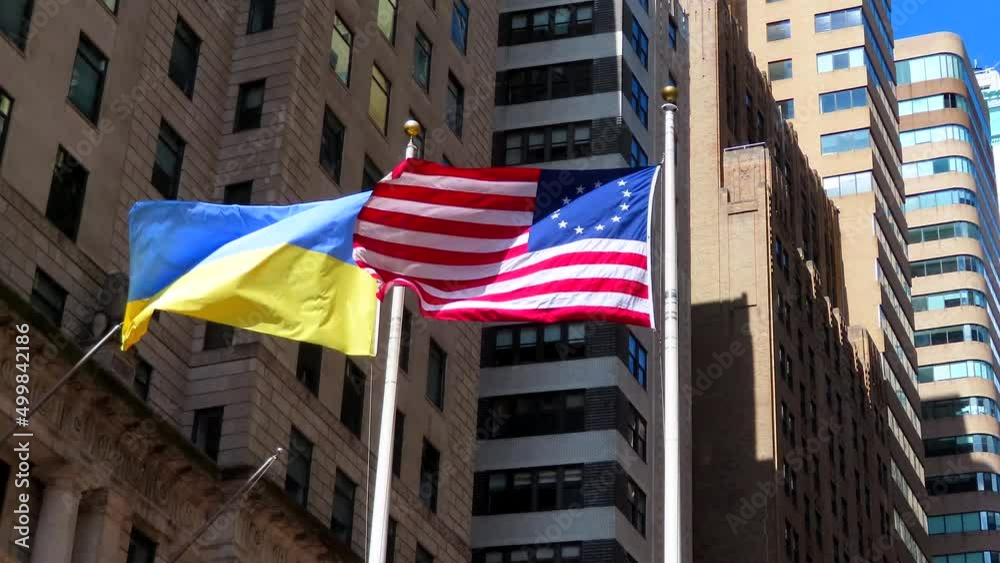USA and Ukraine flags waving together in New York City. United States ...