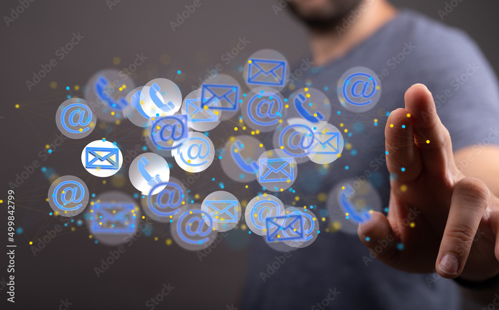 Hand holding using mobile phone with email icon on screen. Concept of ...