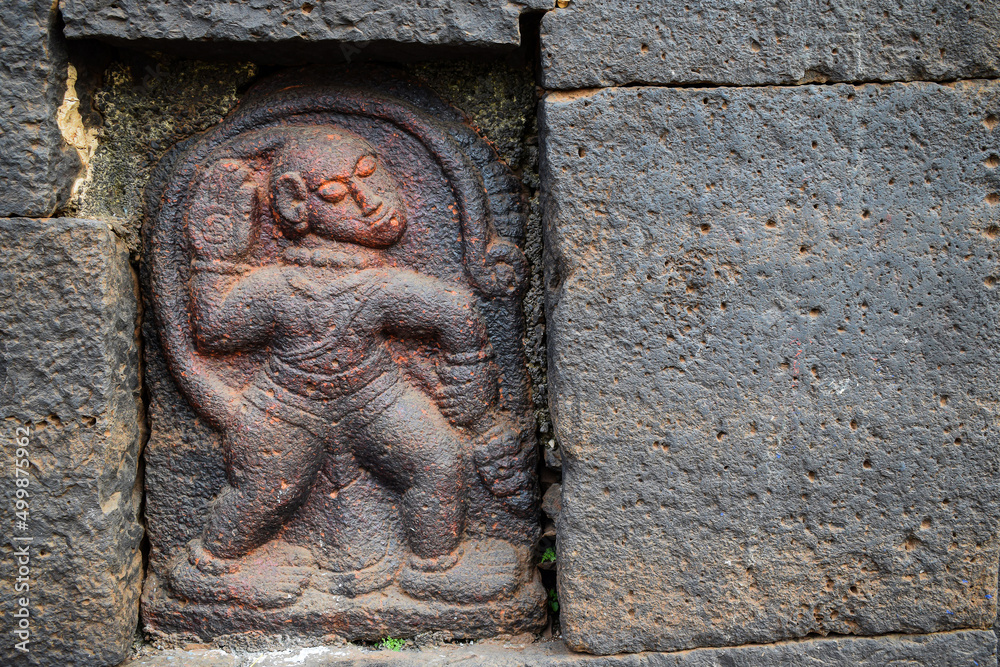 Stock photo of Ancient ruined archeological sculpture of hindu god ...