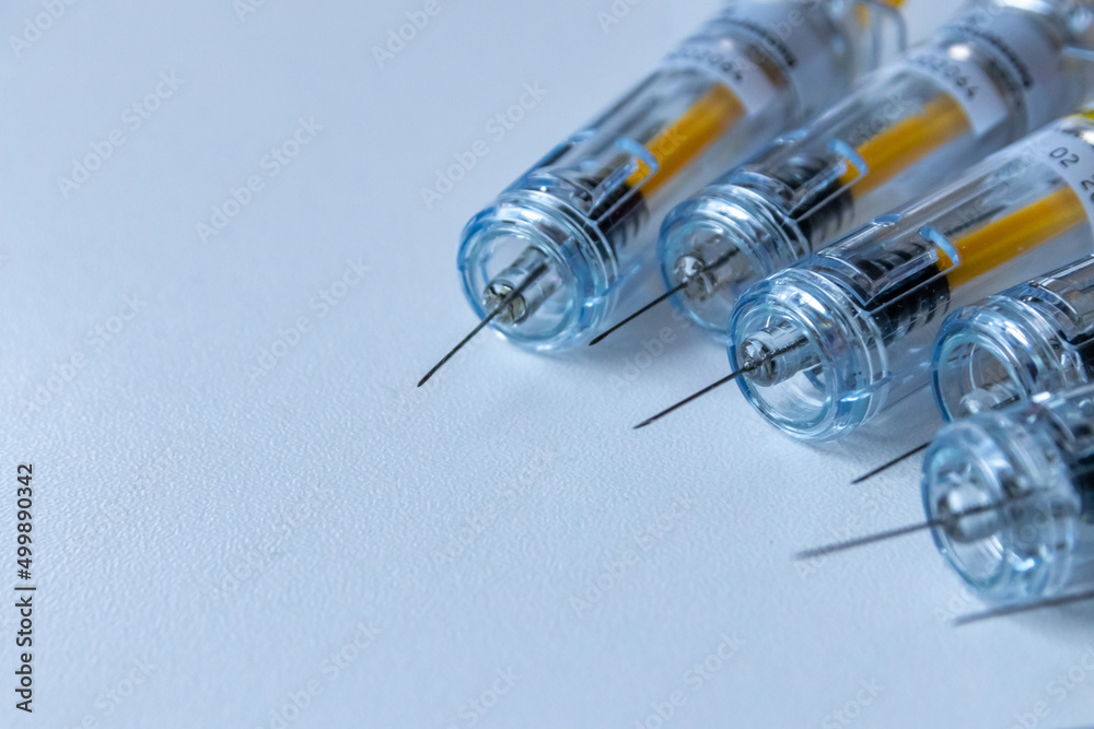 New medical vaccines ready for injection with syringe and vaccine to ...