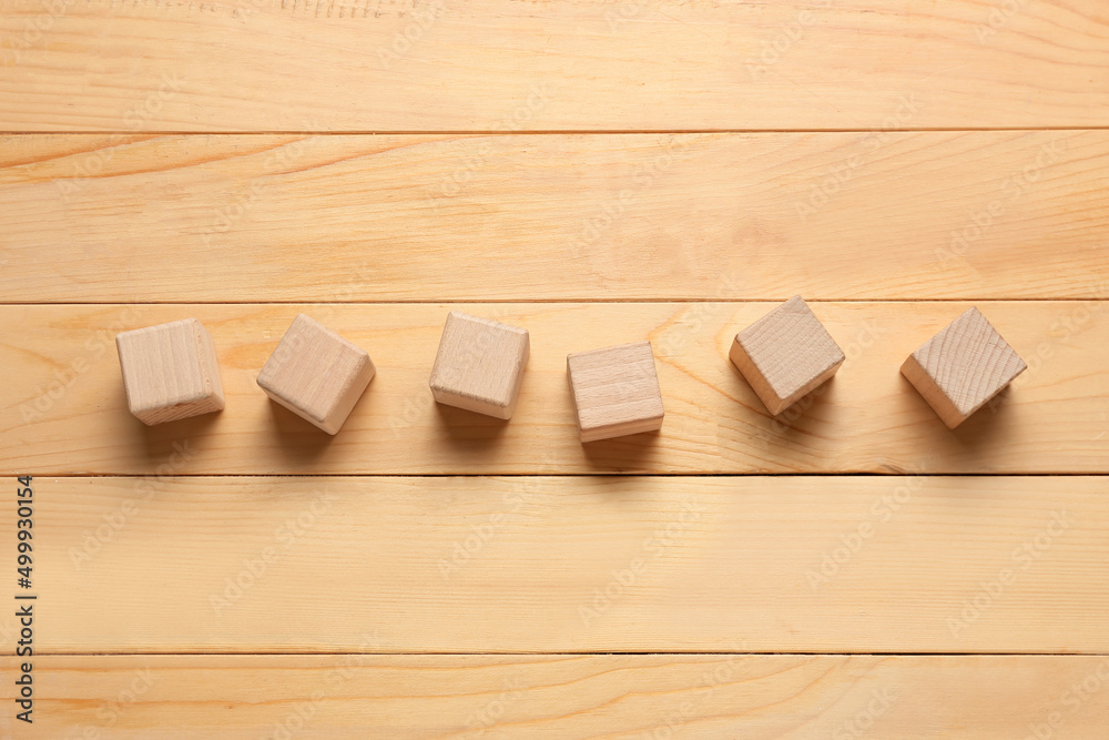 Cubes on wooden background, top view Stock Photo | Adobe Stock