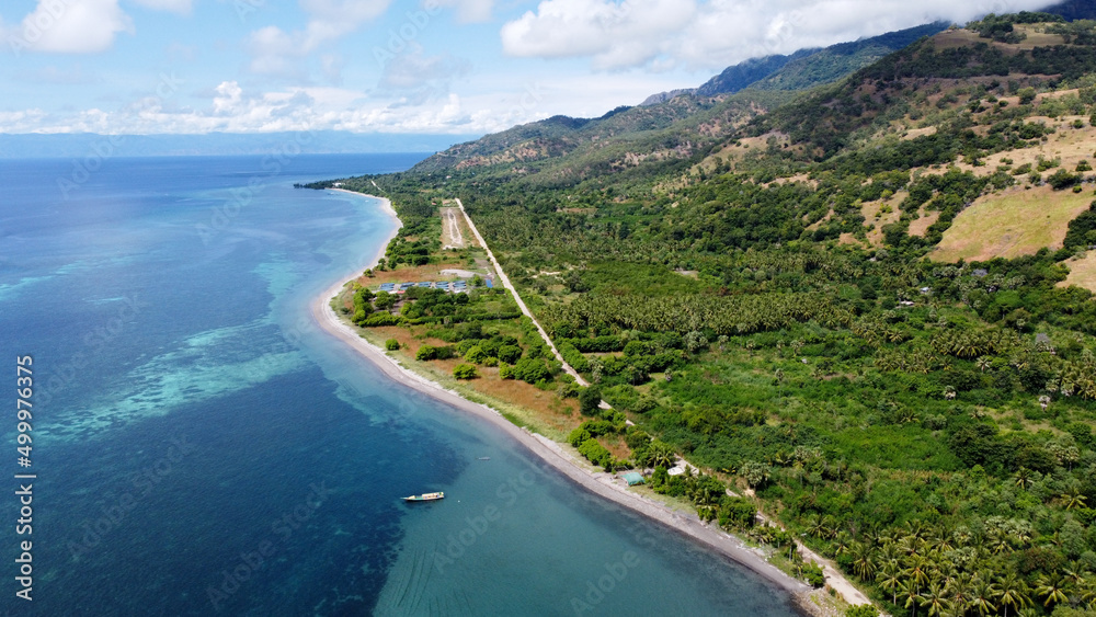 The aeroplane small landing strip, lush green landscape during wet ...