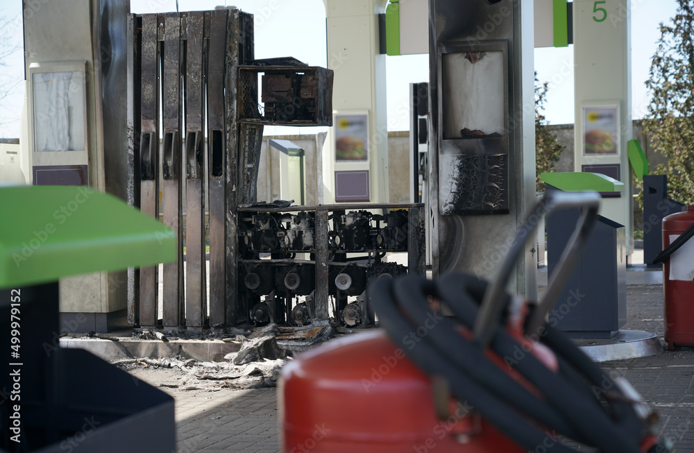 Gas station with a broken station from a shell explosion. Exploded gas ...