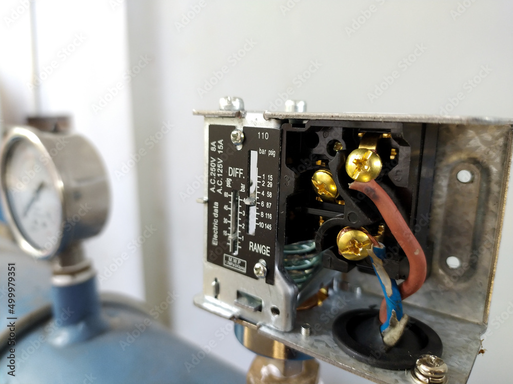 The Pressure control switch with terminal cable and scale number ...