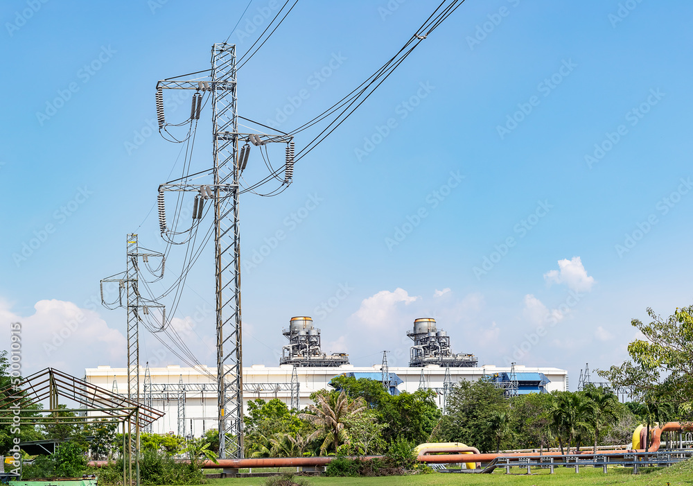 High-voltage power poles from the power plant rice fields to the ...