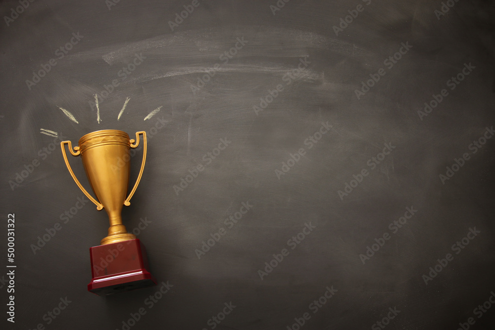 golden trophy over blackboard background. top view. flat lay. Stock ...