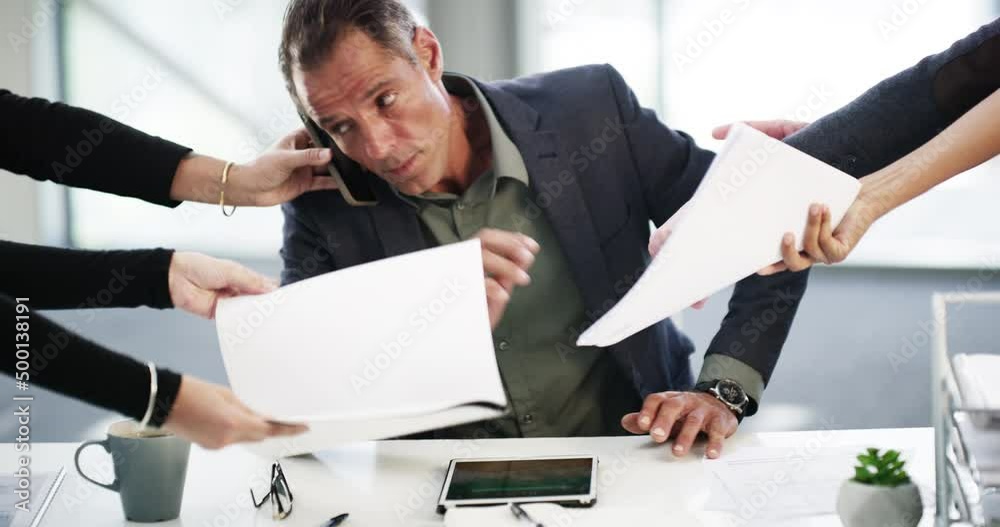 Feeling overwhelmed. 4k video footage of a businessman looking stressed ...