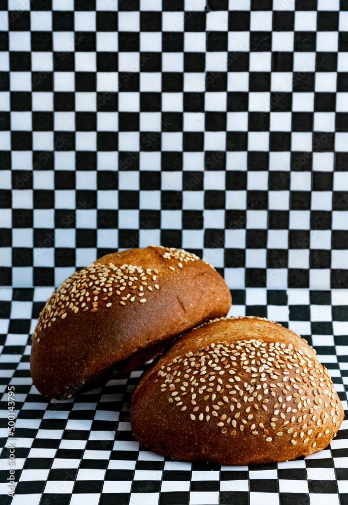 Artisan yolk bread, made in Oaxaca, Mexico. On black and white ...