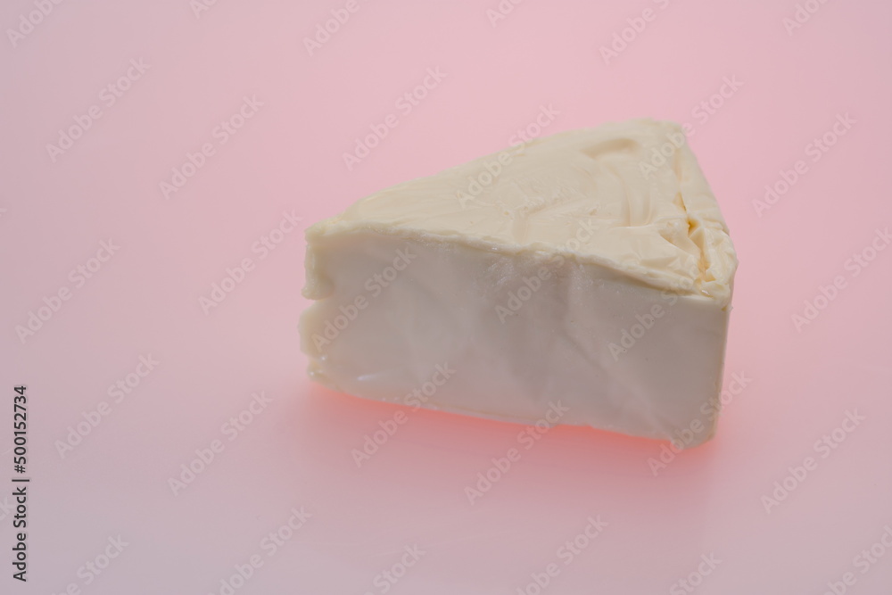 Cheese triangles on a reflective surface,Processed cheese Stock Photo ...