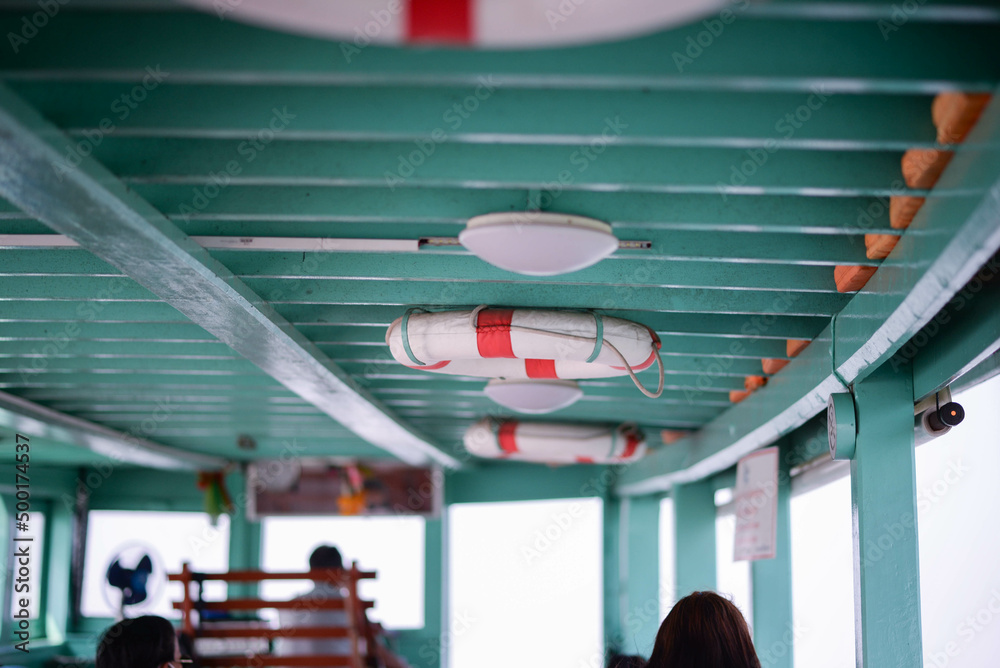 Rubber ring safety on the boat for emergency. Stock Photo | Adobe Stock