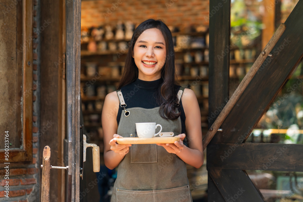 cafe female owner smiling with positive happiness ready to open for ...
