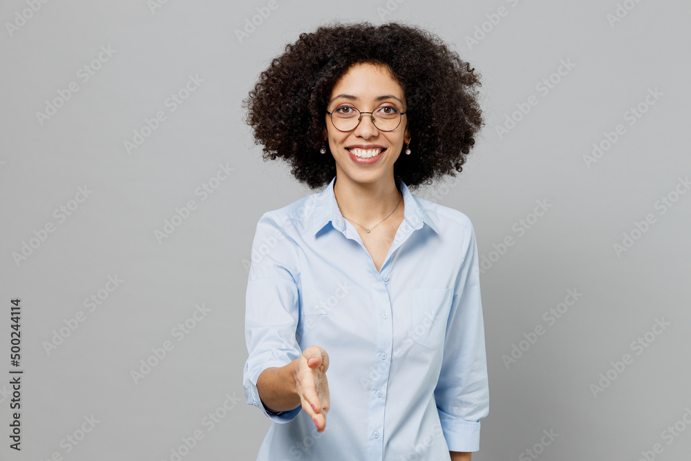 Young employee corporate lawyer woman of African American ethnicity in classic formal shirt work ...